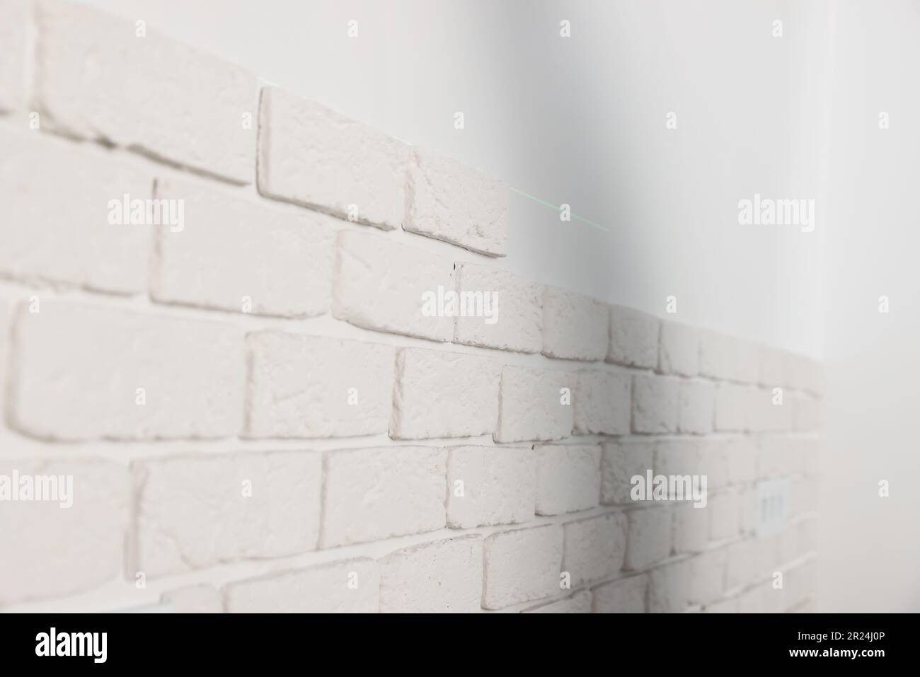 Wall with decorative tiles in room. Interior design Stock Photo - Alamy