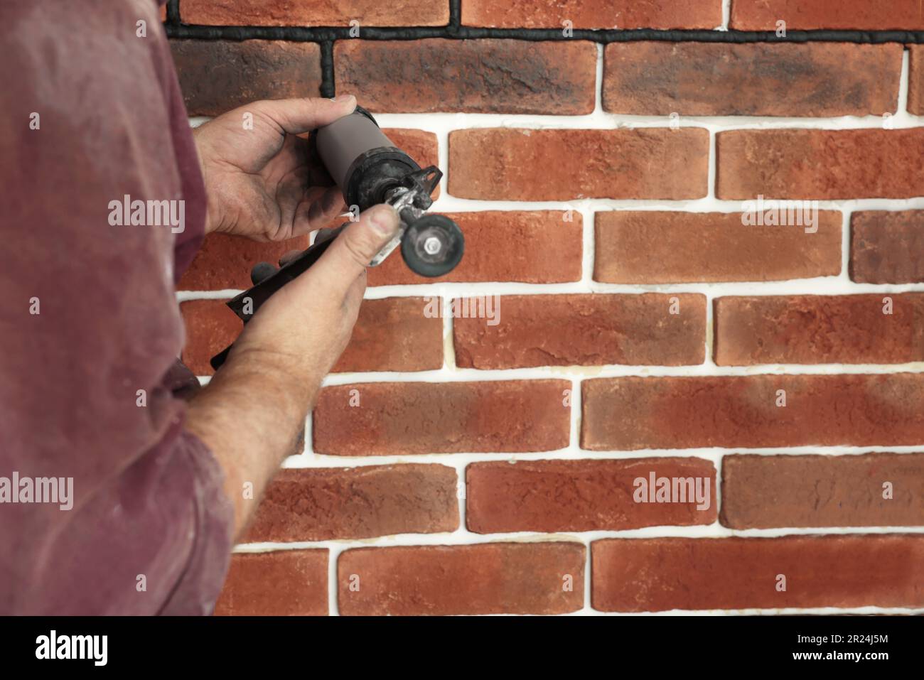 Professional builder using tiling fugue for grouting, closeup Stock ...