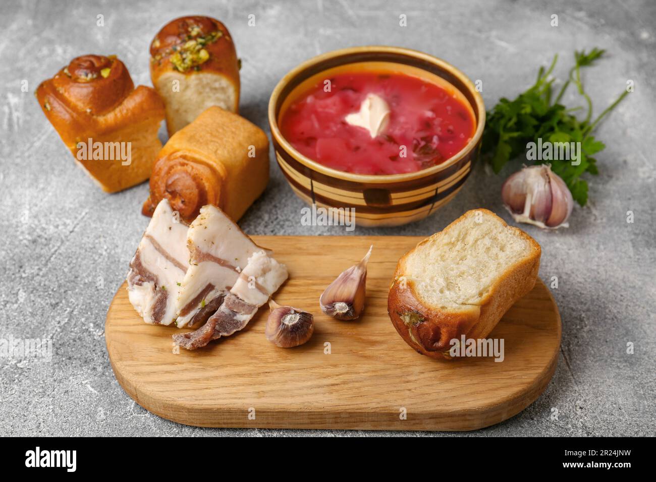 Delicious pampushky (buns with garlic) and salo served for borsch on ...