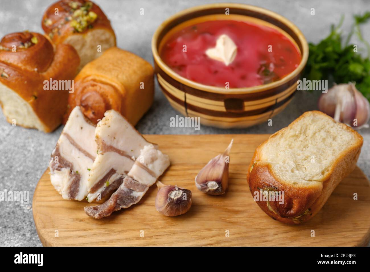 Delicious pampushky (buns with garlic) and salo served for borsch on ...