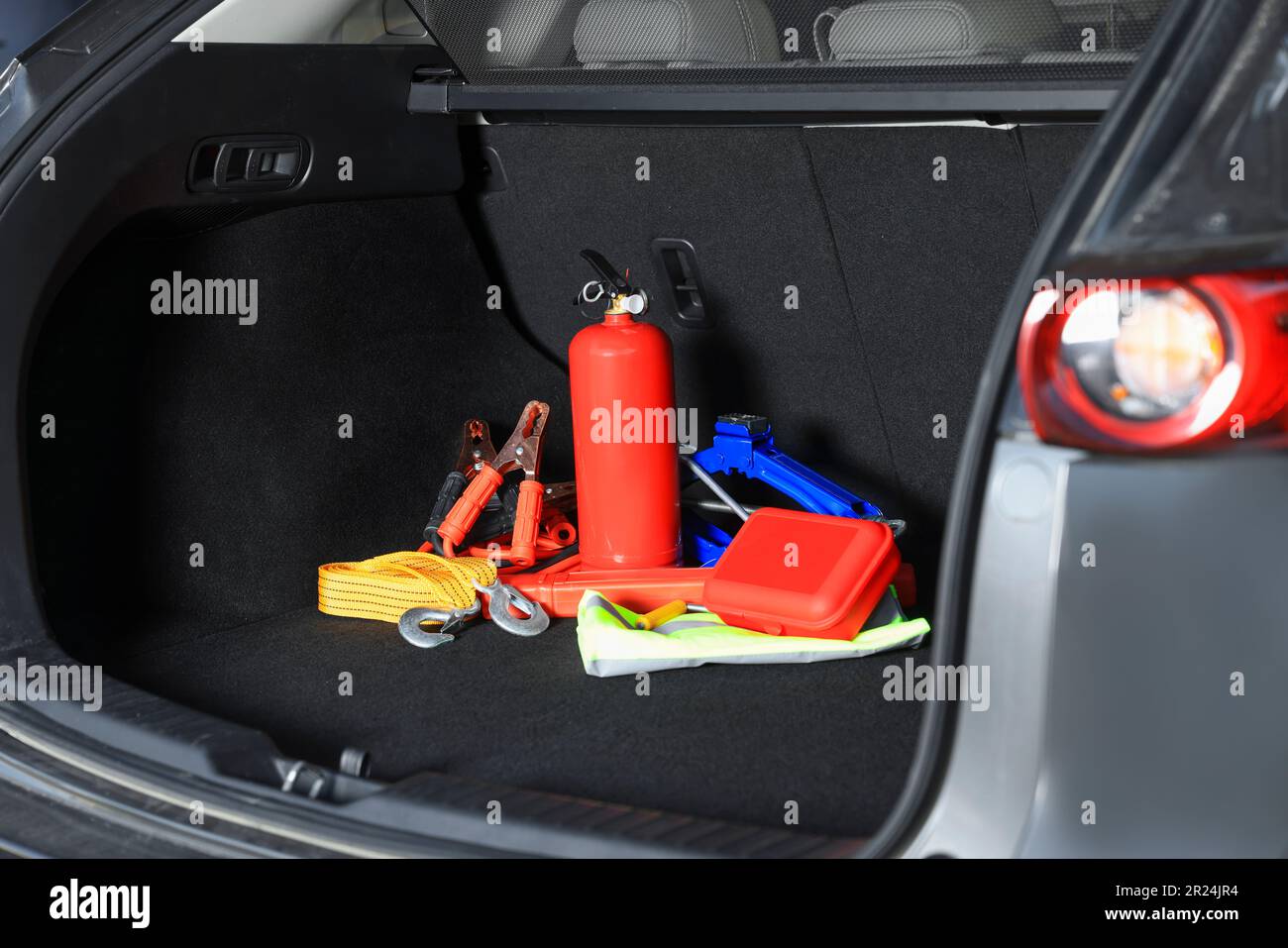 Set of car safety equipment in trunk Stock Photo - Alamy