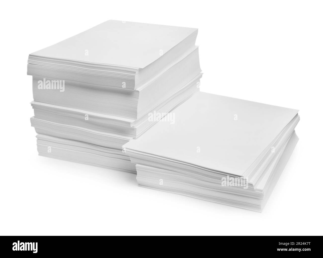 Stacks of paper sheets on white background Stock Photo - Alamy