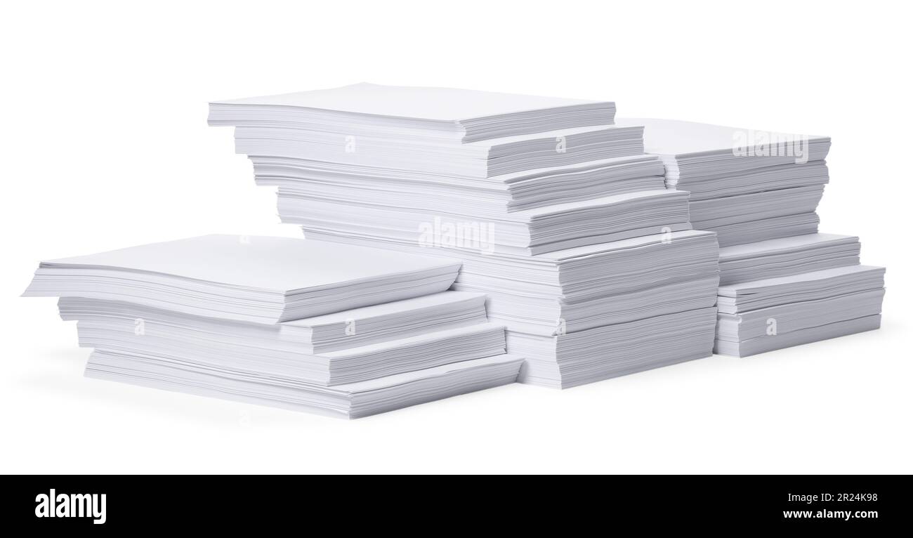 Stacks of paper sheets on white background Stock Photo - Alamy