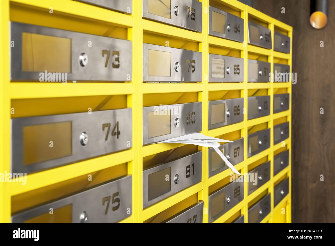 Metal mailboxes with receipts from post office indoors Stock Photo - Alamy