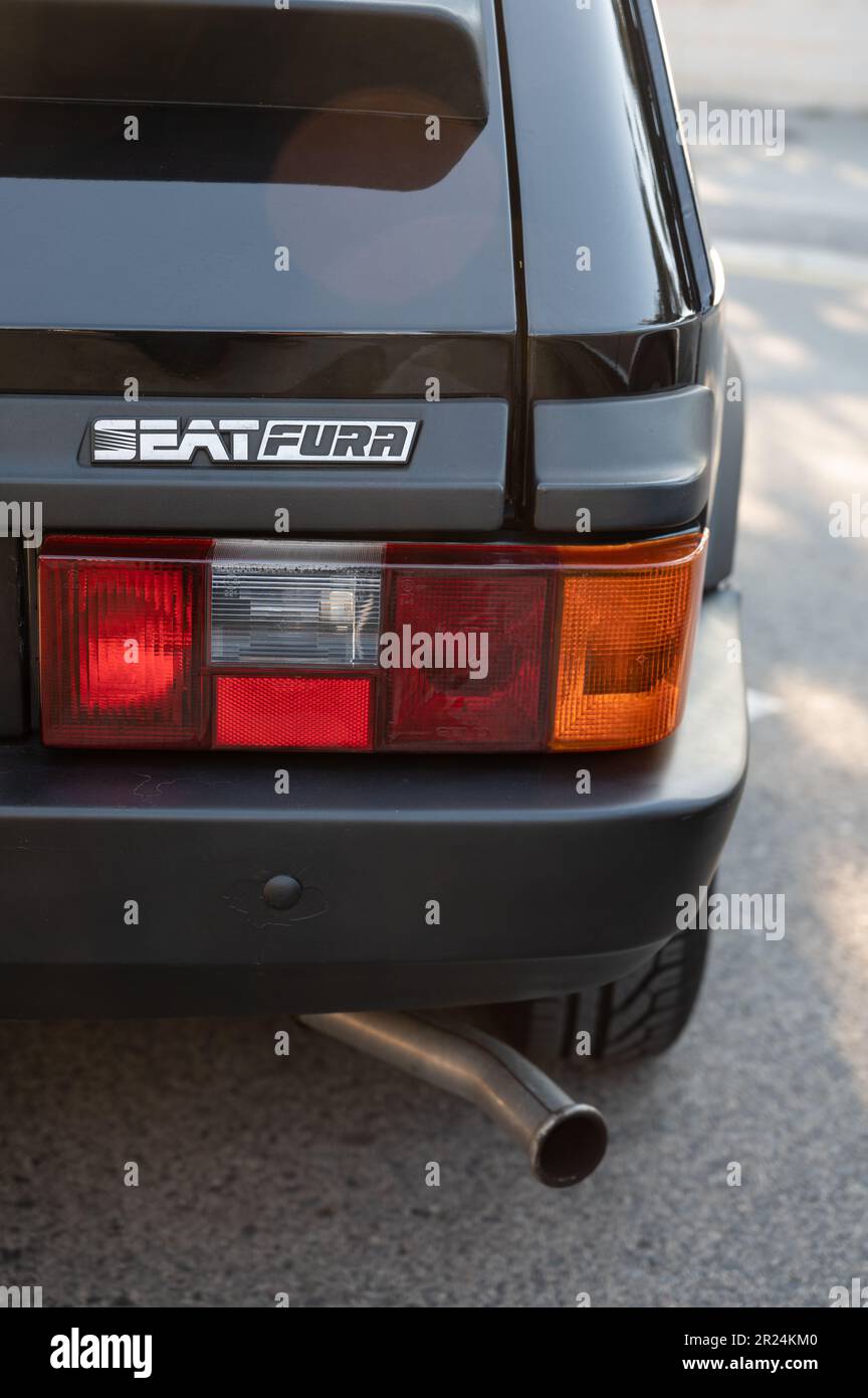 Detail of a small Spanish sports car, it is a black Seat 127 Fura Stock ...