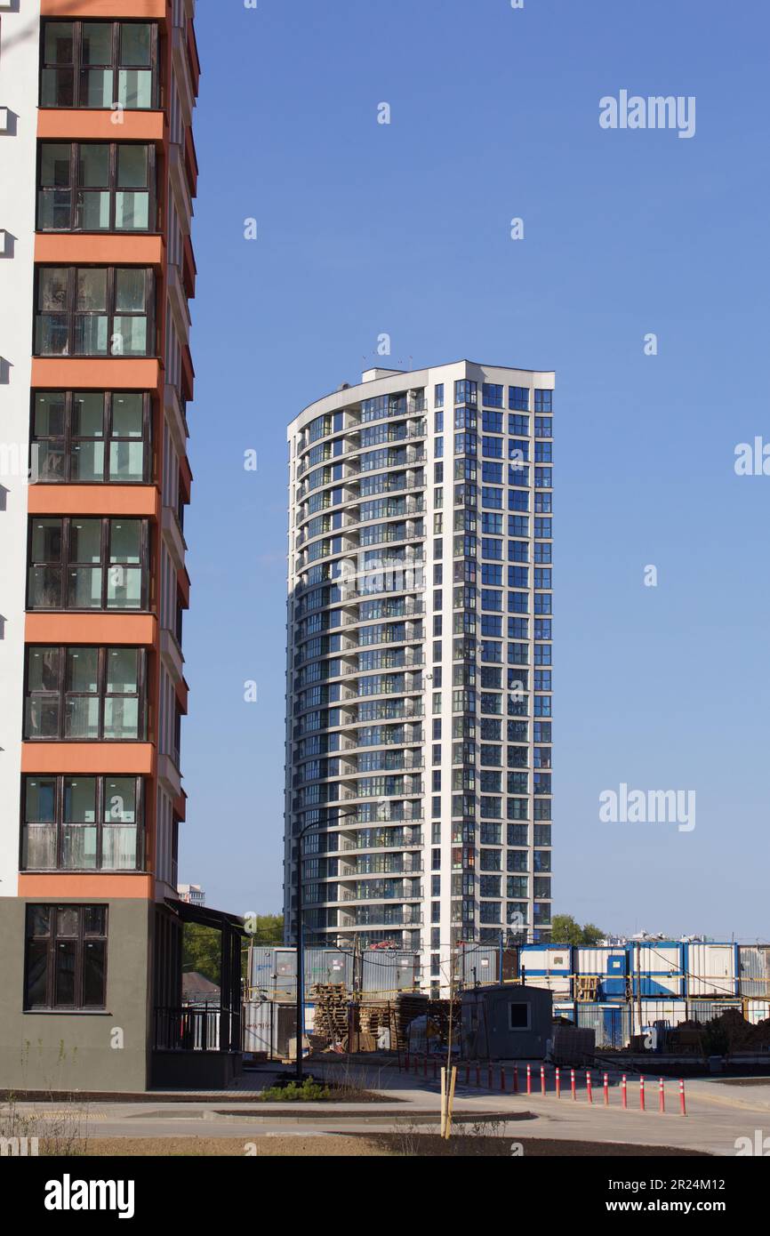 Modern high-rise buildings made of concrete and glass. Color design of ...