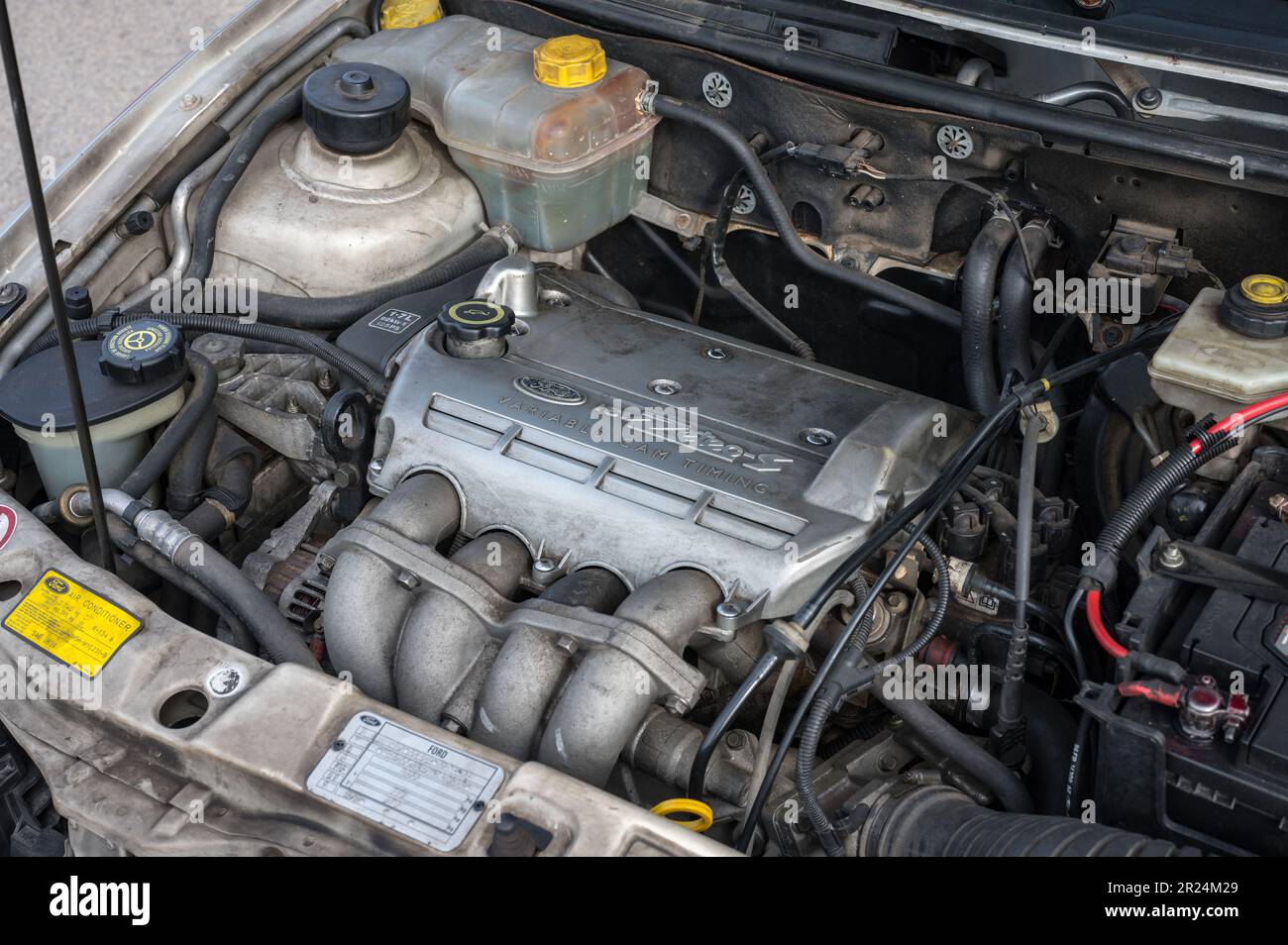 Detail of the engine of an unusual white Hyundai Scoupe, it has a 1.7 ...