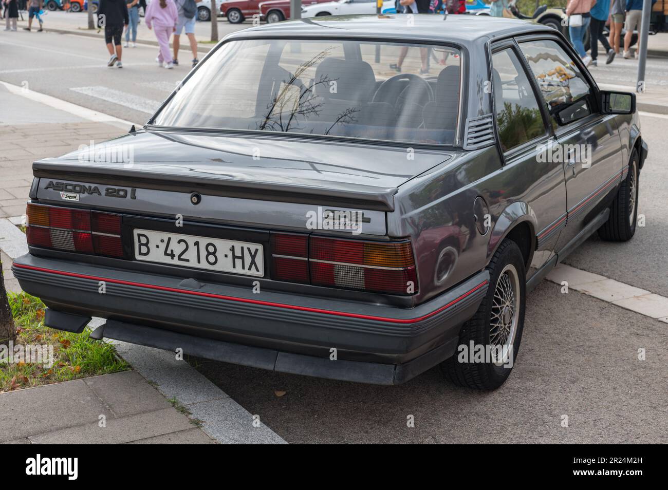 Rear view of an old dark gray Opel Ascona 2.0 I parked in the street ...