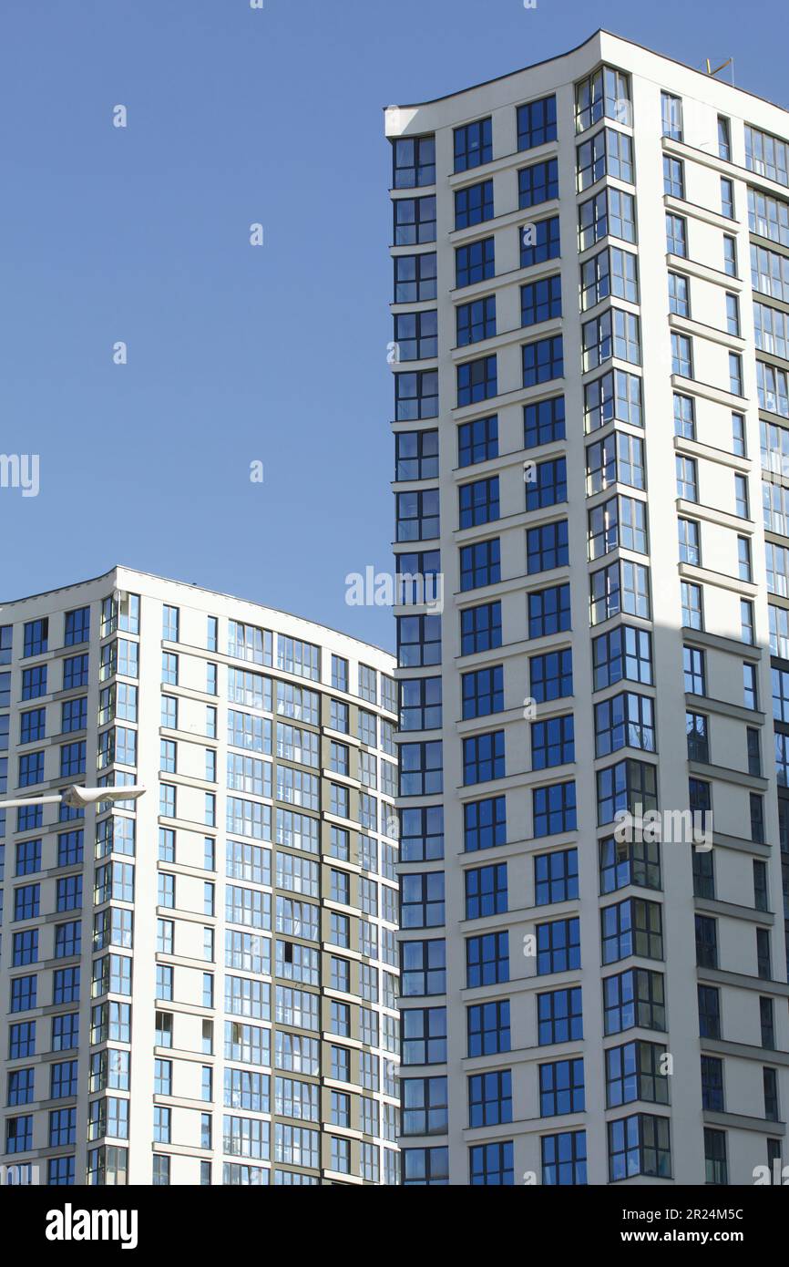 Modern high-rise buildings made of concrete and glass. Construction ...