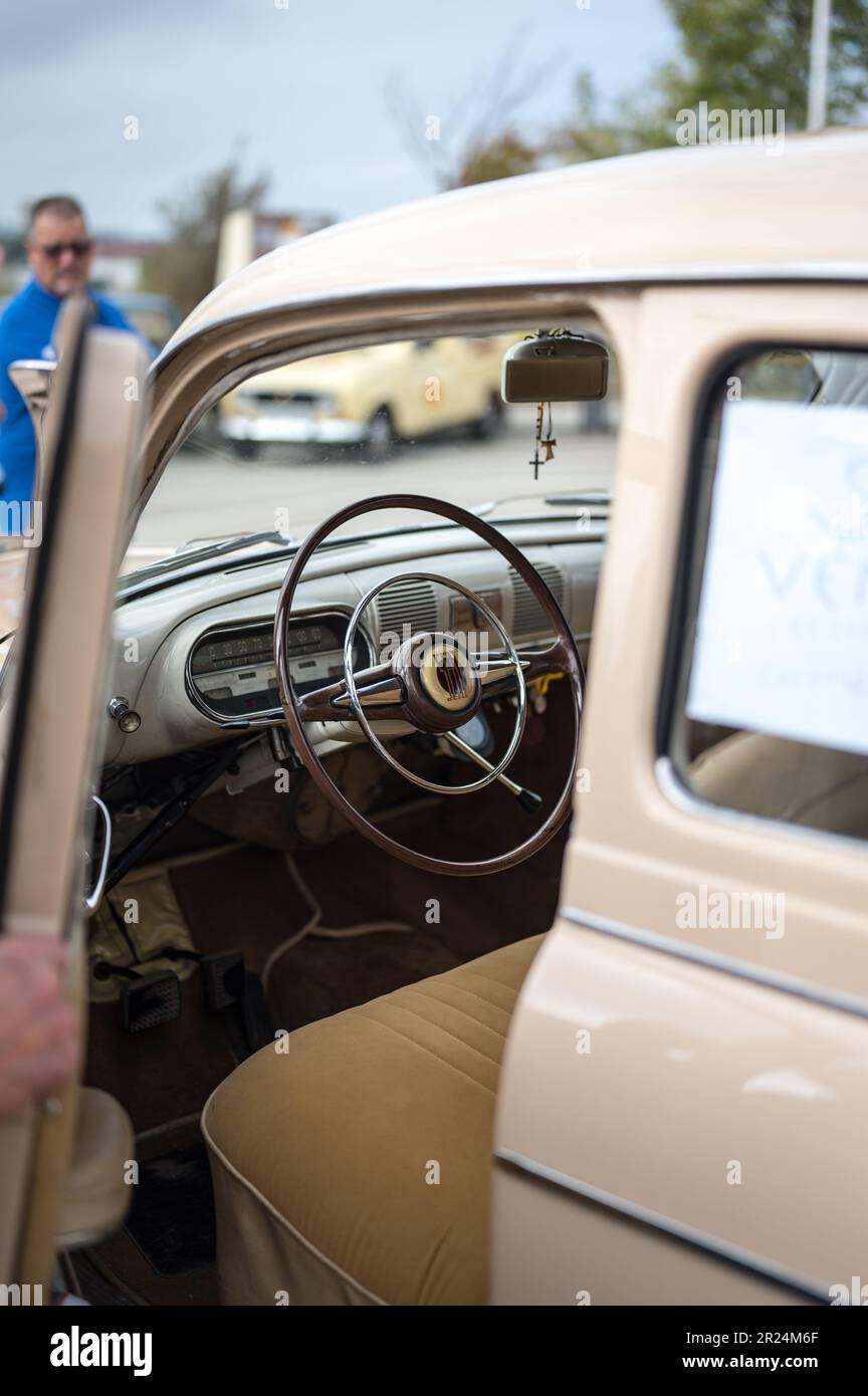 Detail of the interior of a typical old Spanish car, it is a cream ...