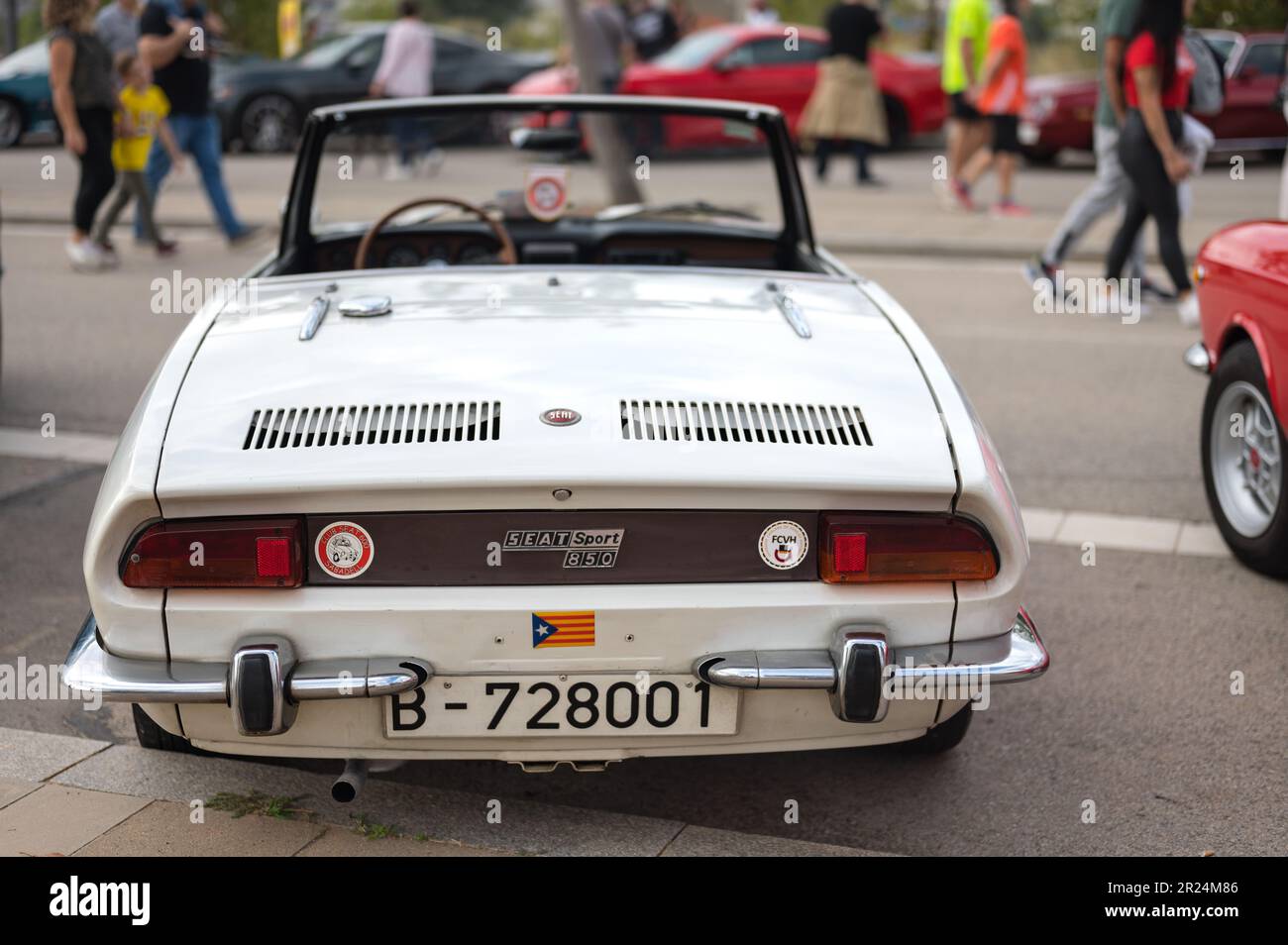 Rear view of a small classic Spanish convertible sports car, the white ...