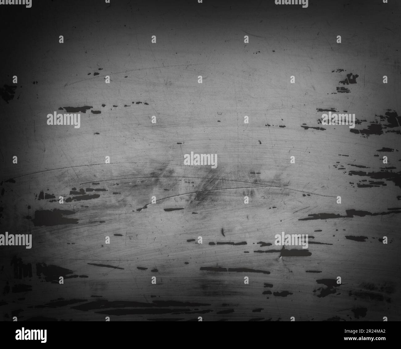 An abstract scratchy grunge gritty surface texture backdrop overlay in ...