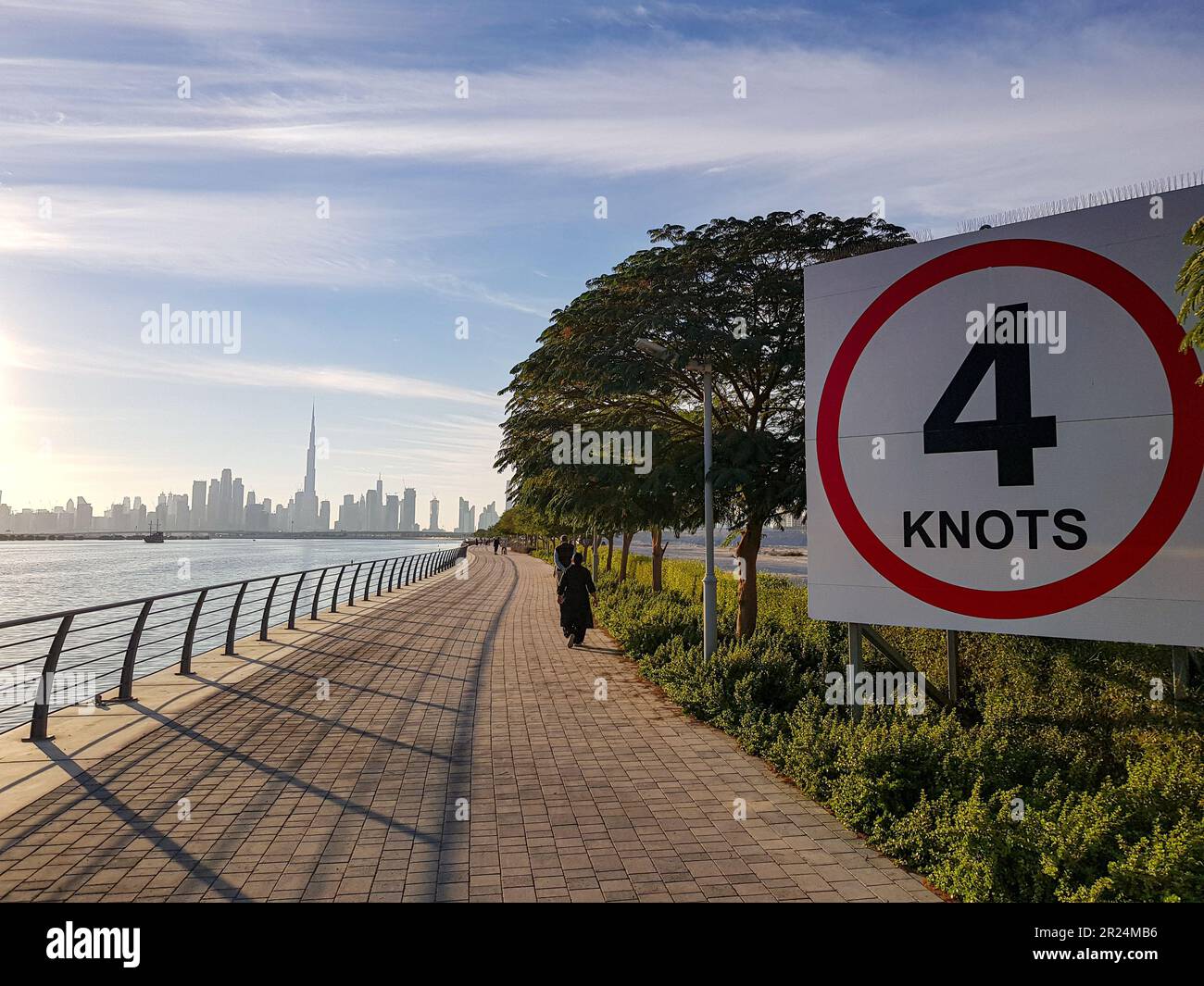 DUBAI, UAE - CIRCA 2022: Maritime speed sign on Dubai water chanel with ...