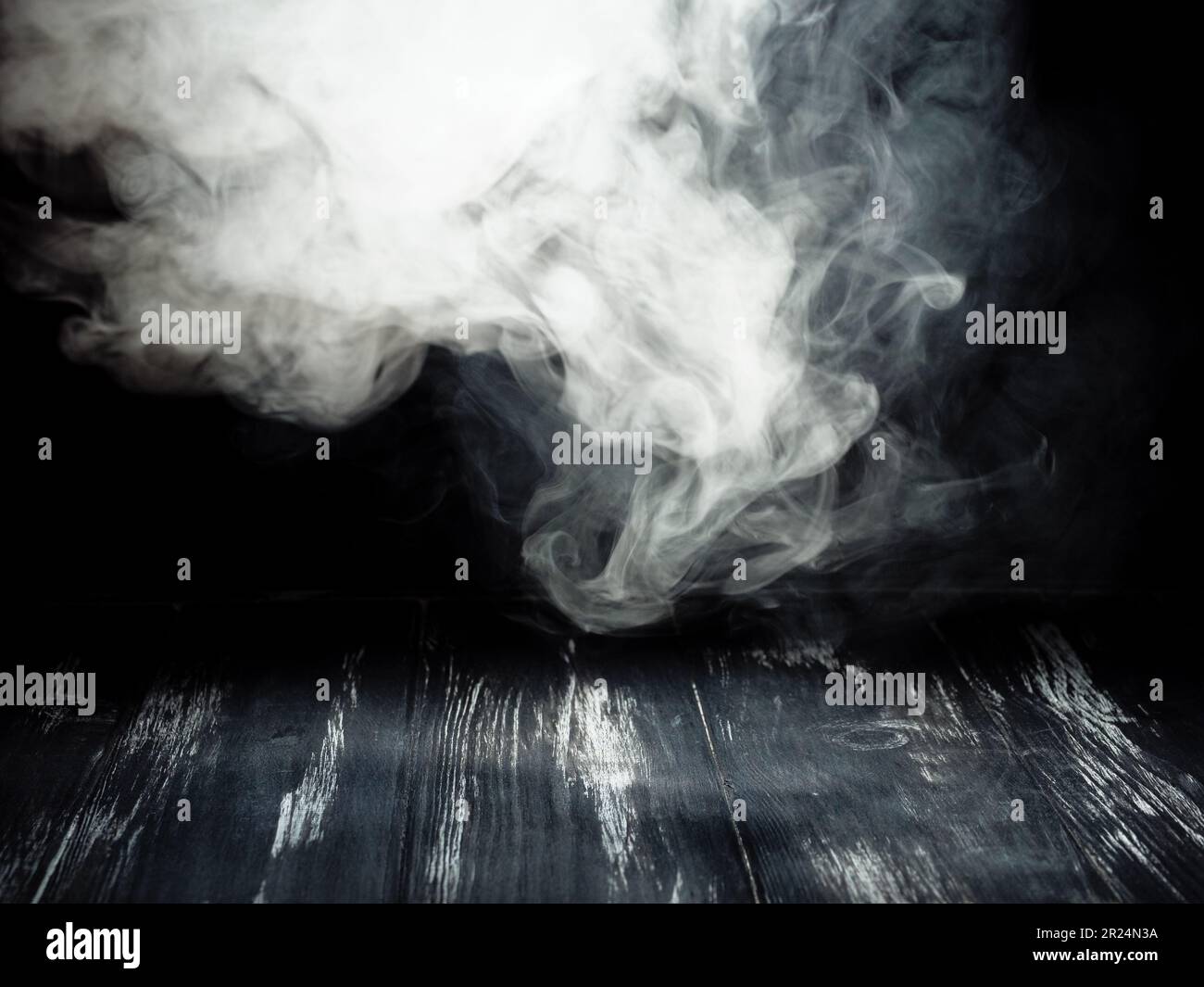 Background for product presentation with white smoke over a dark wooden ...