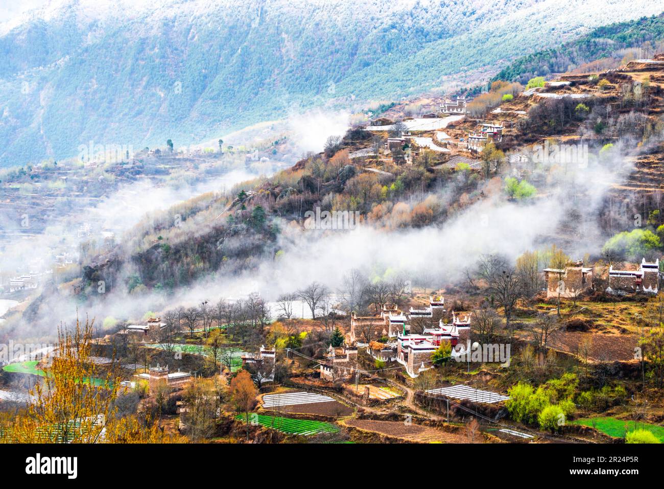 village in the fog Stock Photo - Alamy