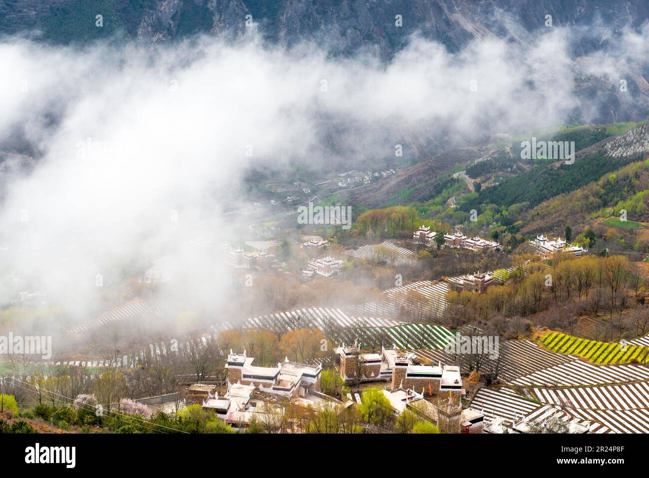 Village in the fog hi-res stock photography and images - Alamy