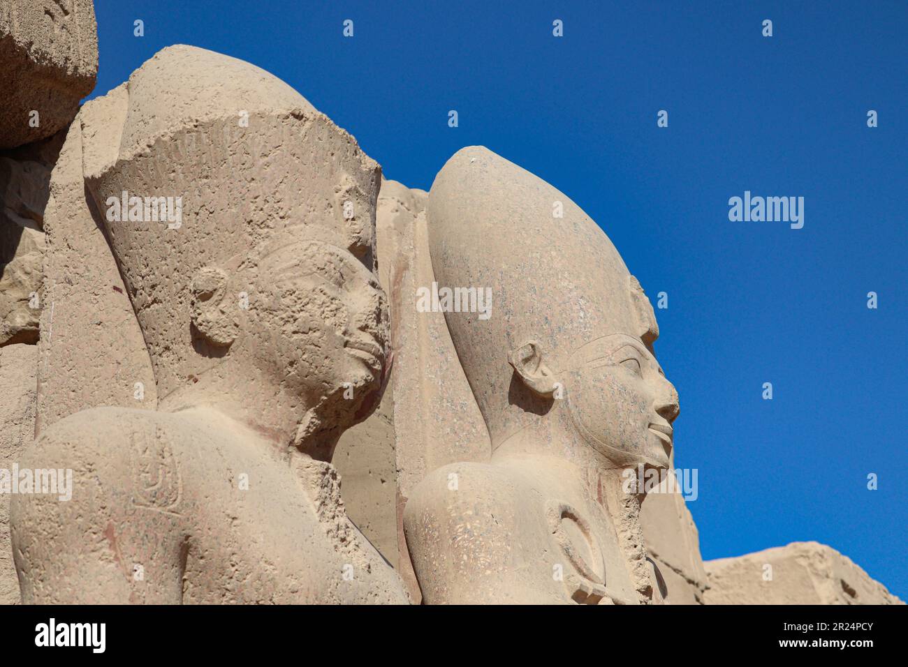 Ancient egyptian statues at Karnak temple in Luxor, Egypt Stock Photo ...
