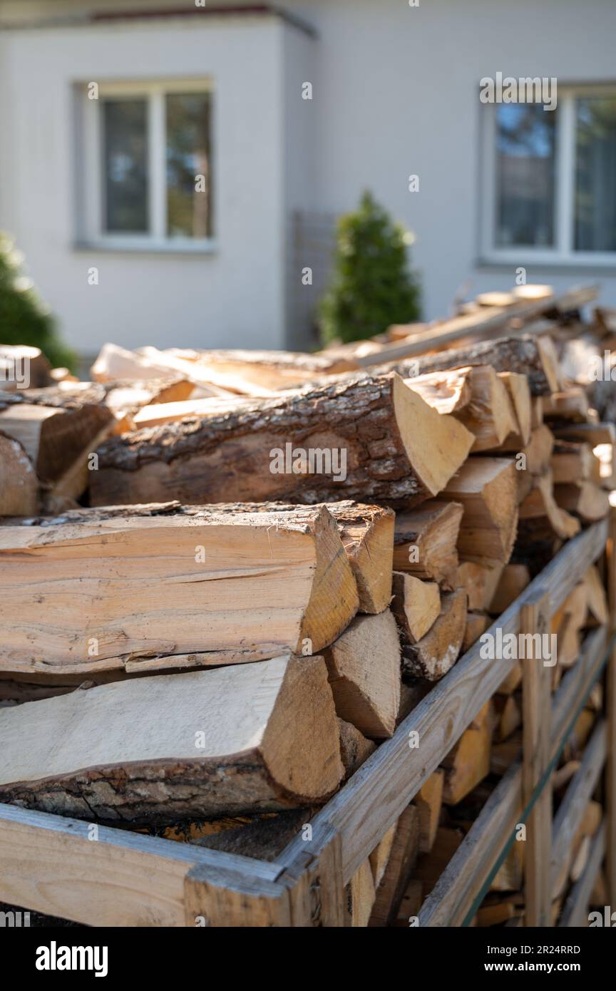 Pallet with firewood on private backyard with house on background Stock ...