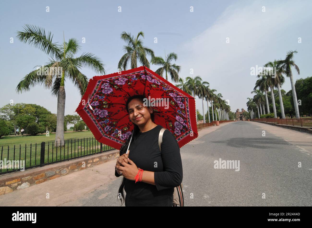 New Delhi, Delhi, India. 17th May, 2023. Girl in Garden under the ...