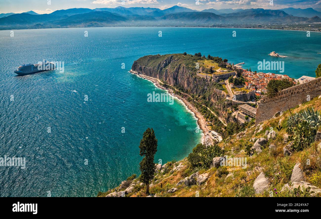 Akronauplia fortress in center, town of Nafplio on right, cruise ship ...