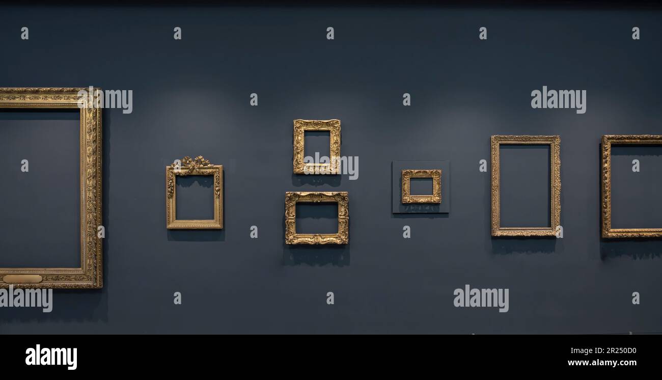 Paris, France - 05 13 2023: Louvre Museum. A series of golden frames of ...