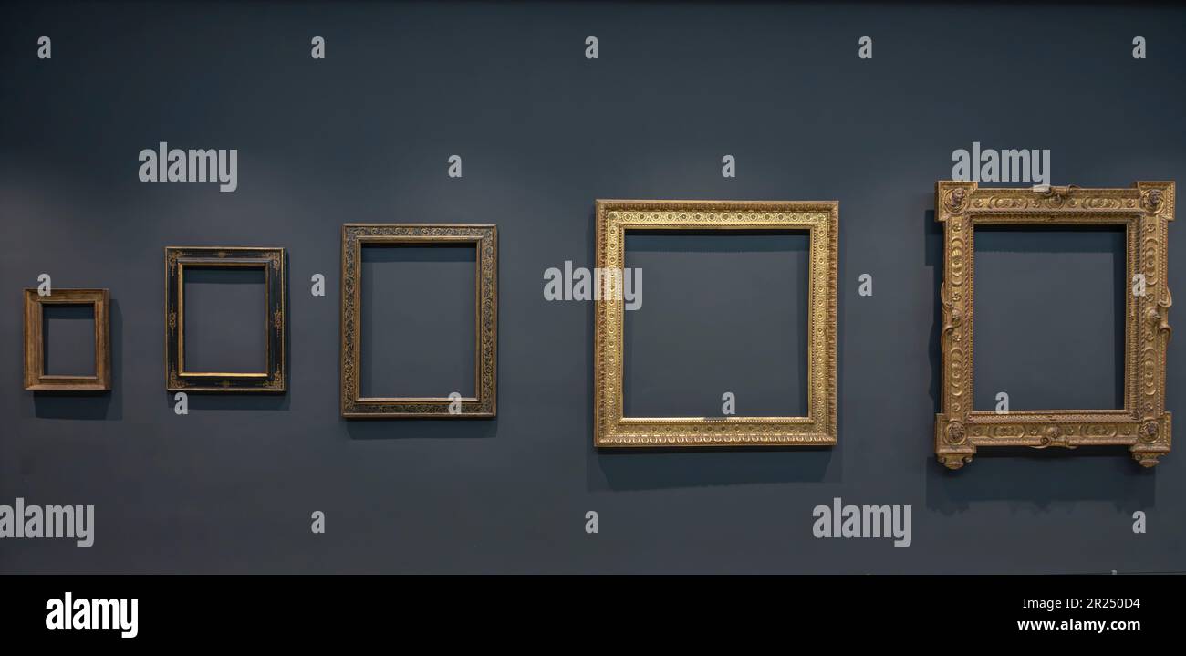 Paris, France - 05 13 2023: Louvre Museum. A series of golden frames of ...