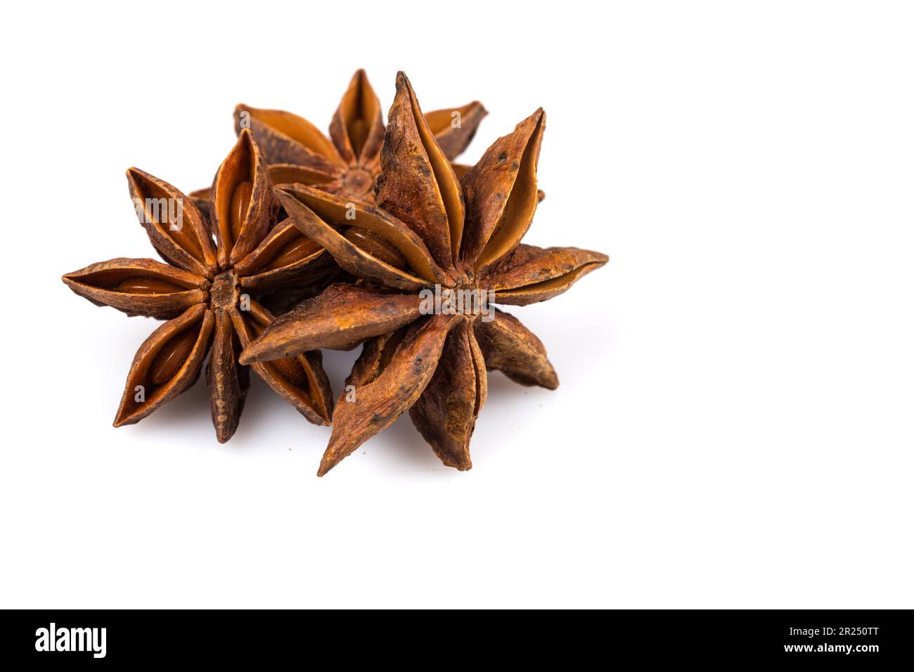Stars of anise isolated on white background Stock Photo - Alamy