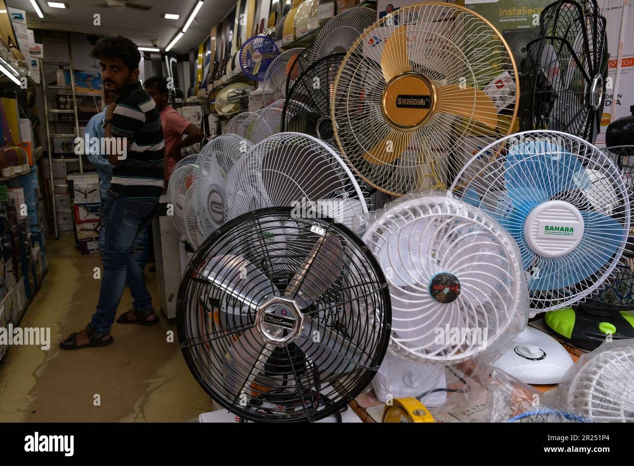 Kolkata, India. 17th May, 2023. Fans seen displayed for sale in a shop ...