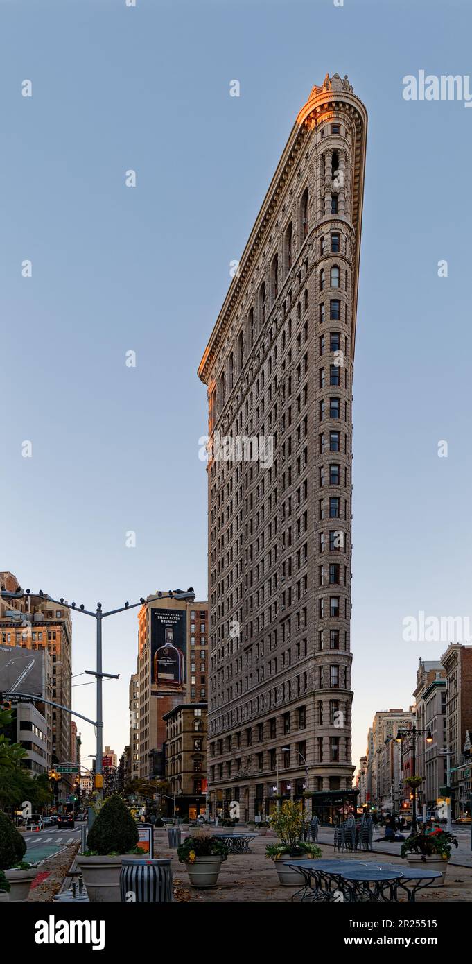 The Flatiron at sunrise: Only the crown and upper stories glow as the ...