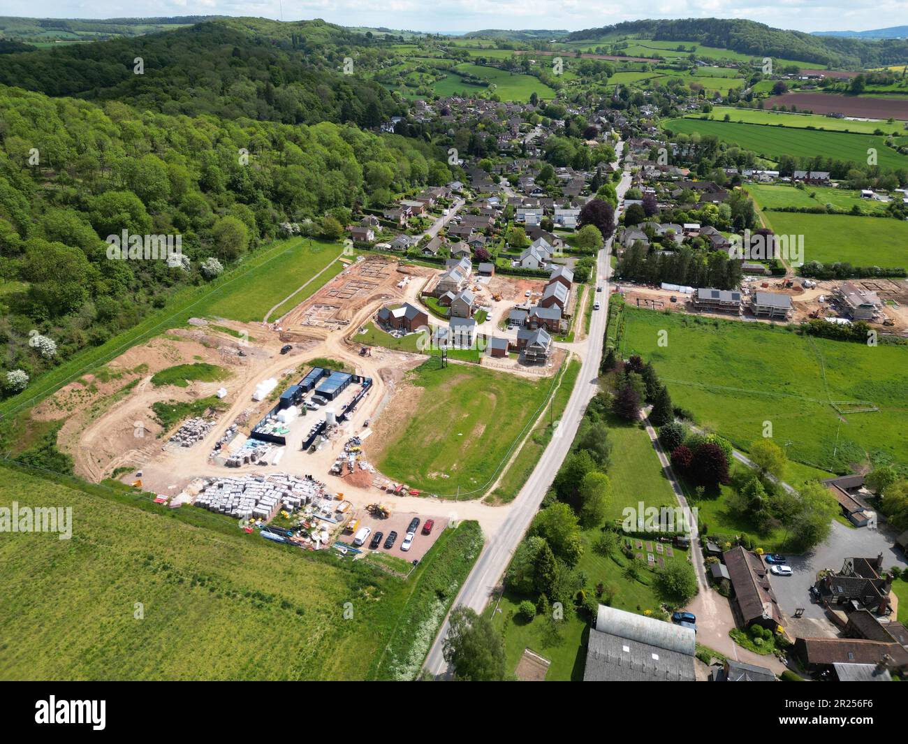 Aerial view of new build housing construction site on the edge of Fownhope village in rural ...