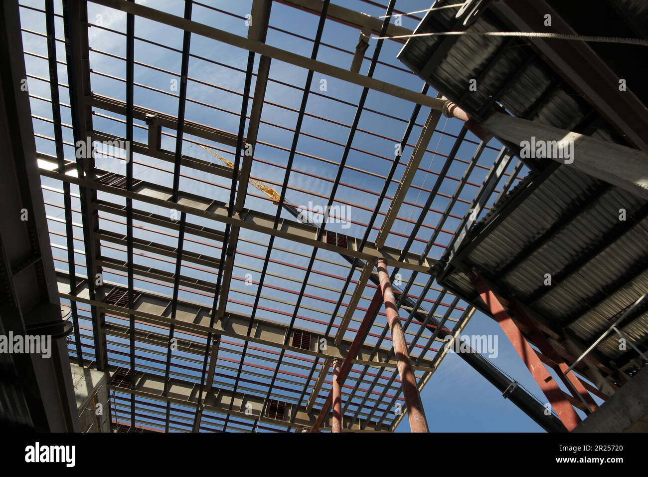 Steel frame of a new factory building under construction Stock Photo ...