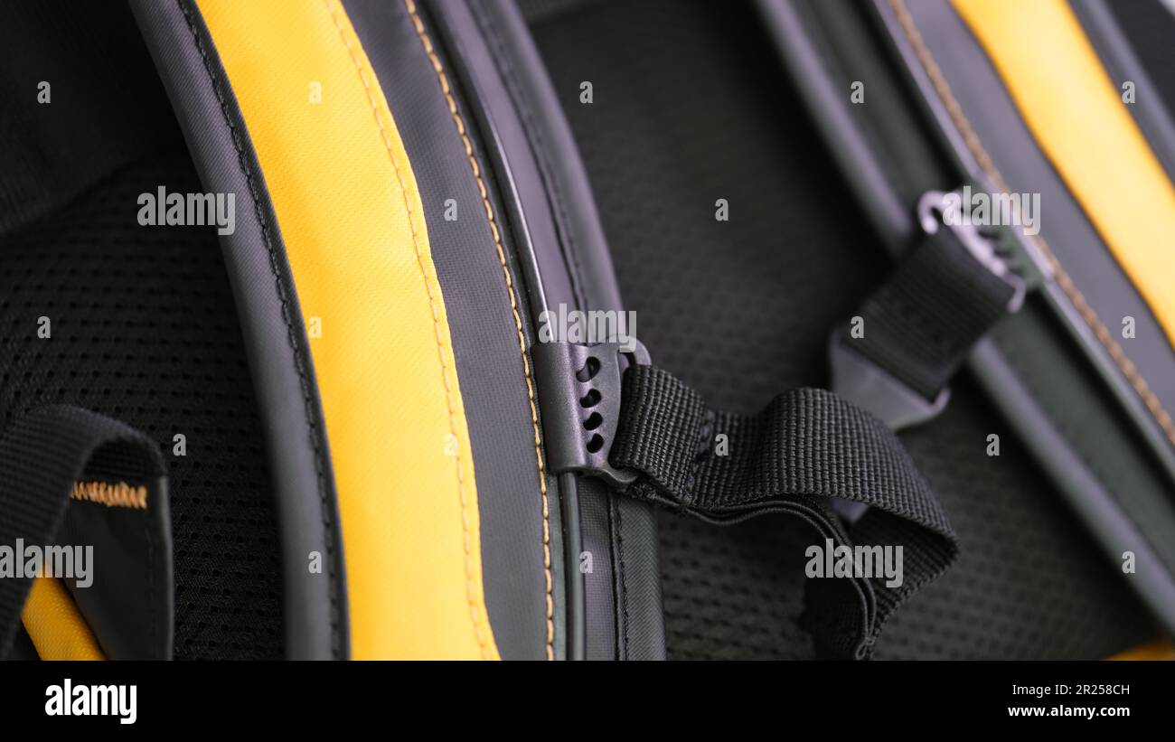 Shoulder straps in yellow and black backpack for comfortable carrying ...
