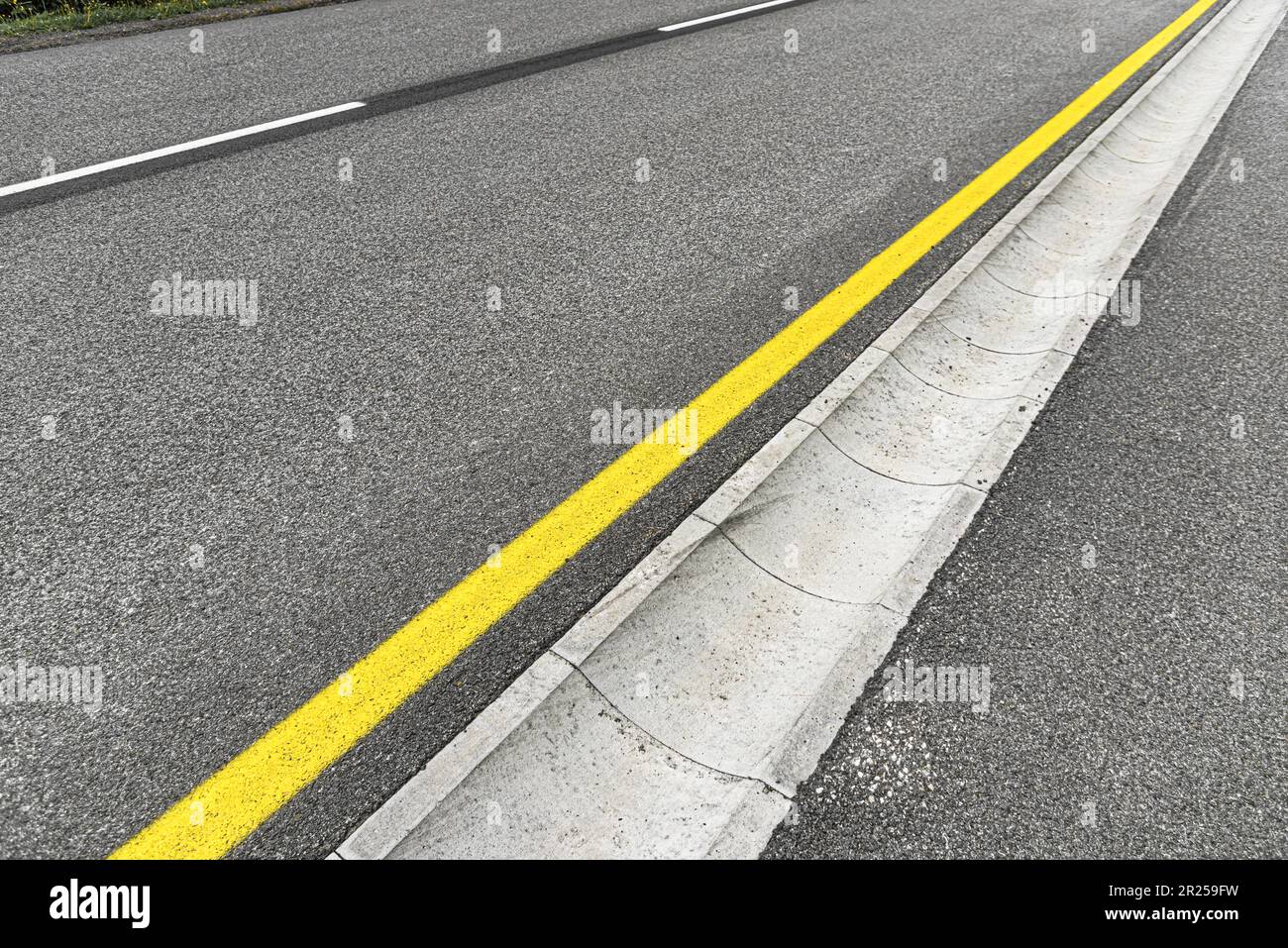 Stormwater on an asphalt road Stock Photo - Alamy