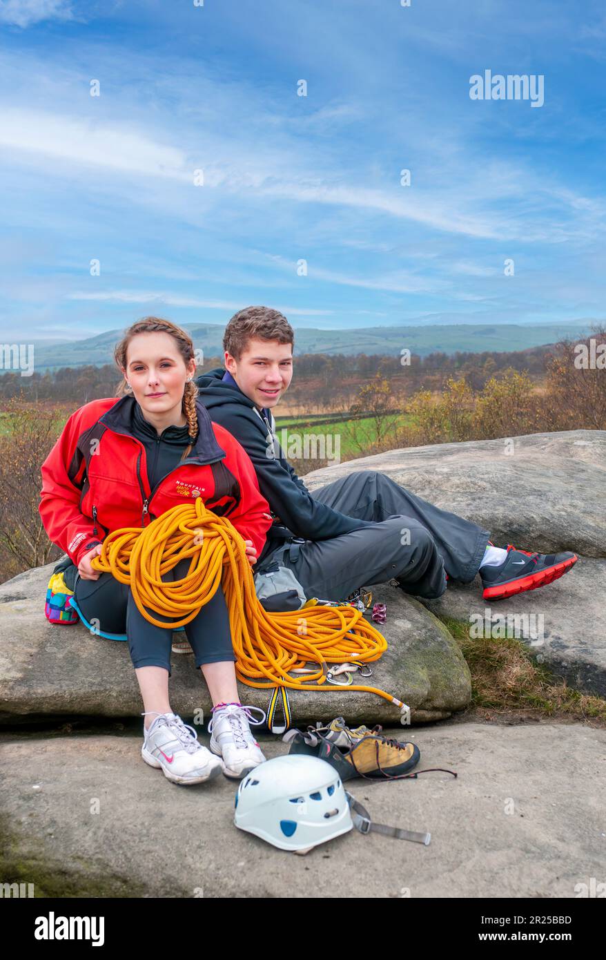 Young teenager rock climbers on Birchen Edge in The Peak District of ...