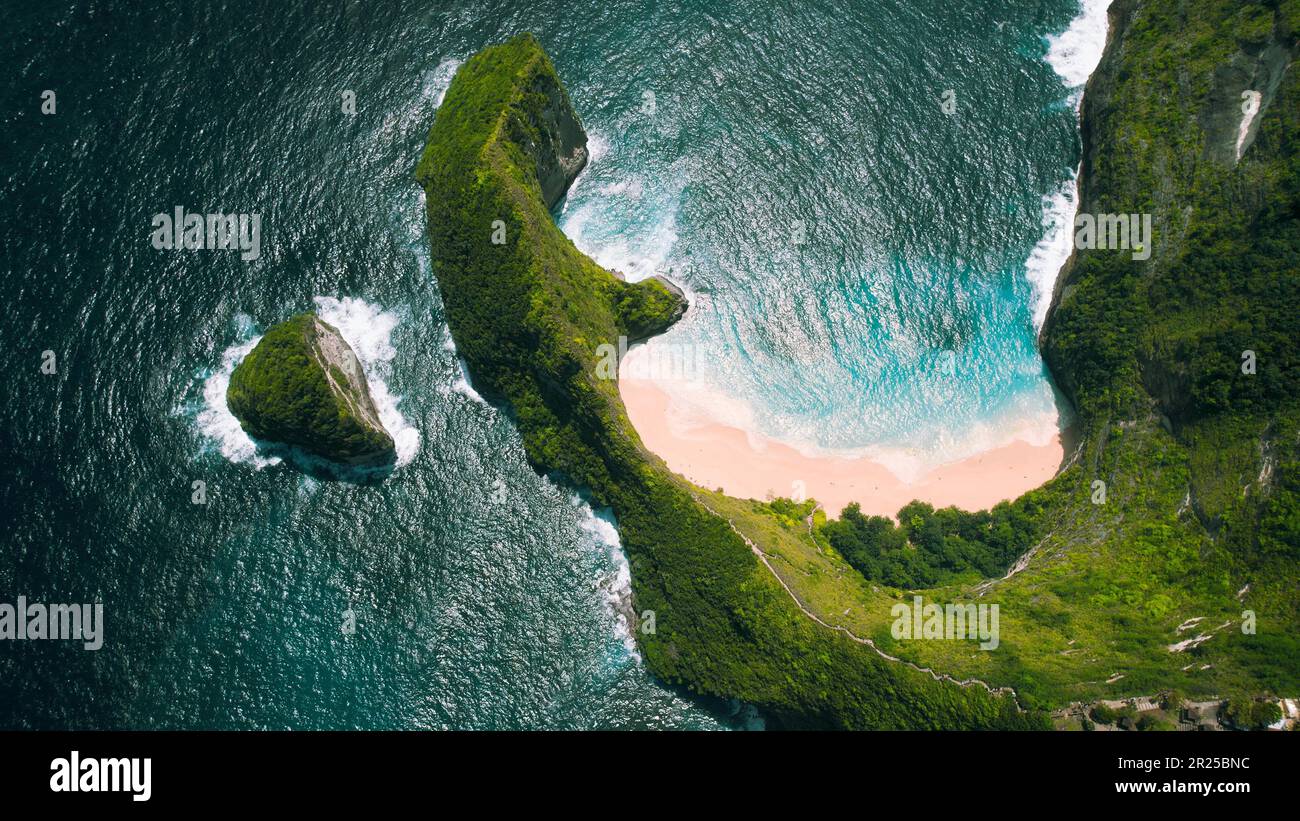Mountain rainforest by the ocean with golden sandy beach Kelingking ...