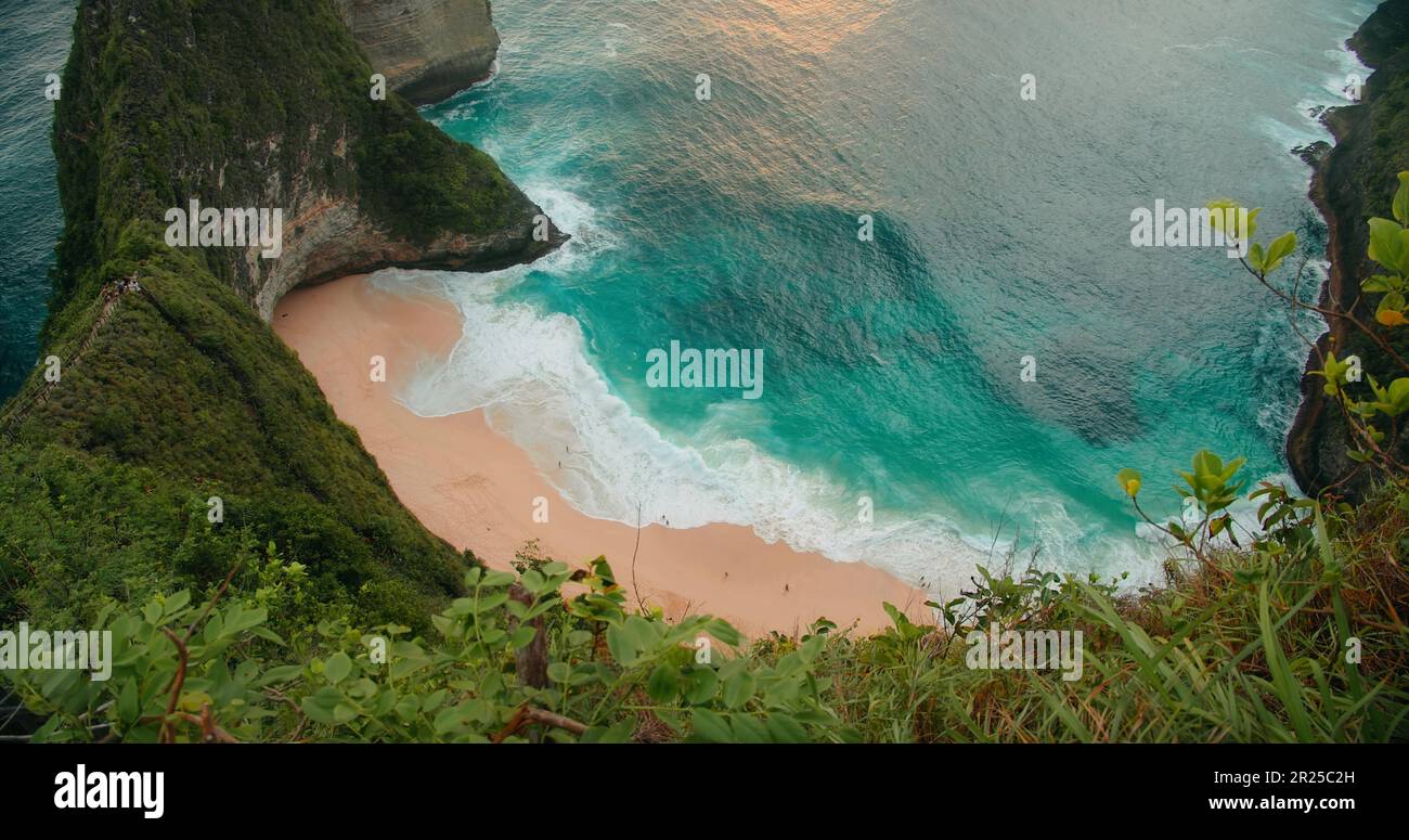 Sunset on pristine tropical Kelingking beach with golden sand in Nusa ...