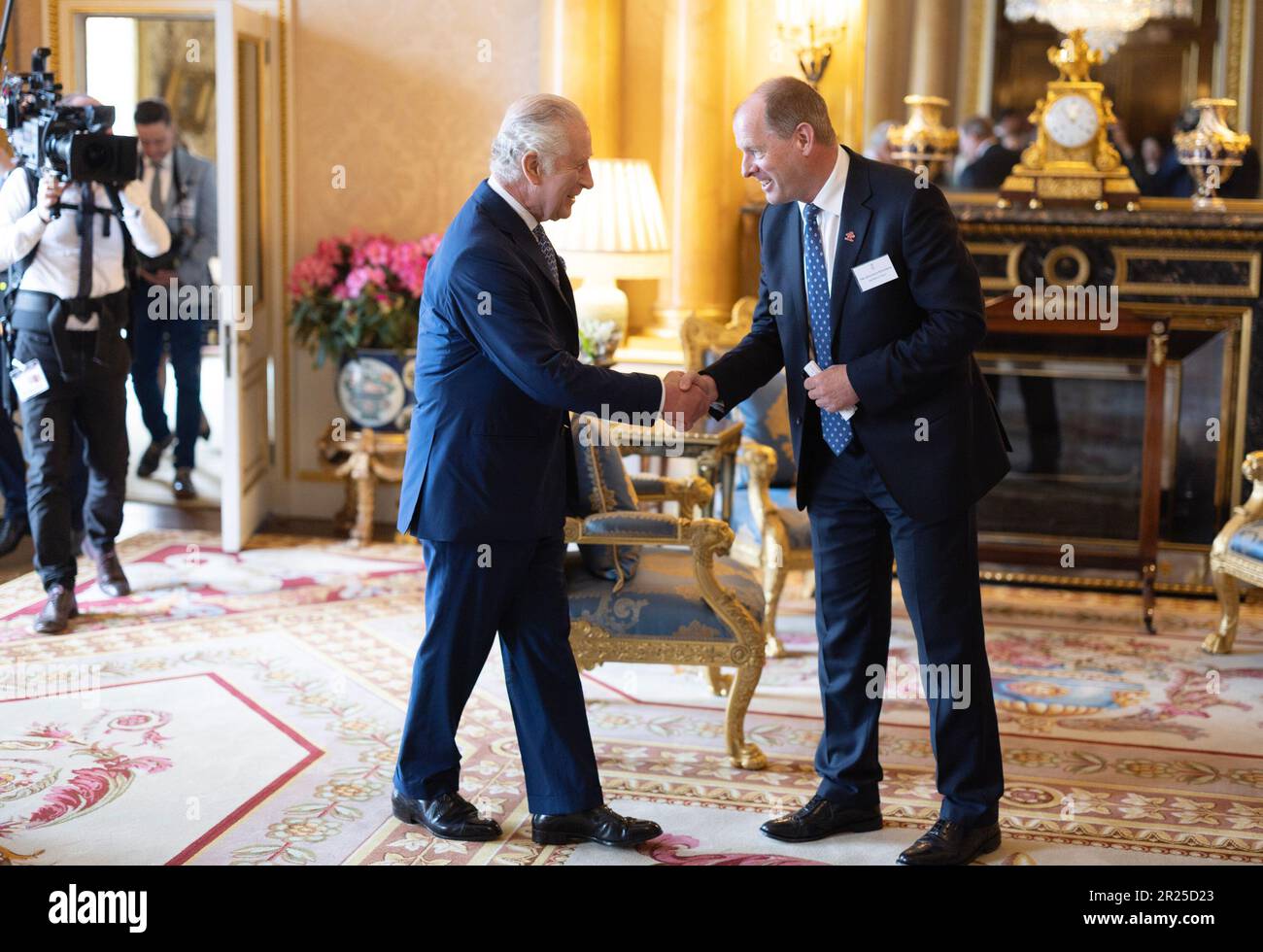 King Charles III is greeted by the UK CEO Prince's Trust Jonathan ...