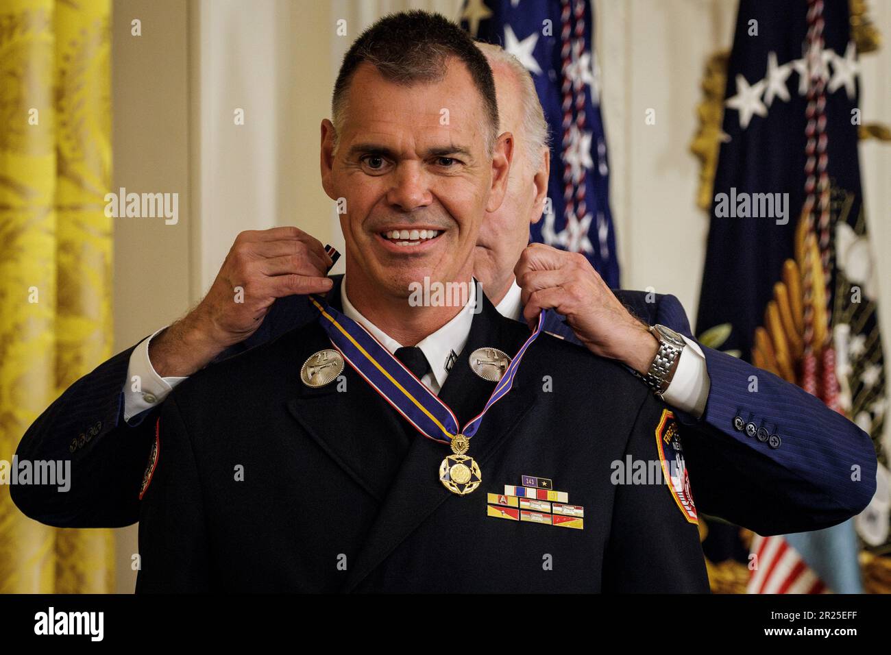 Washington, United States. 17th May, 2023. President Joe Biden presents ...