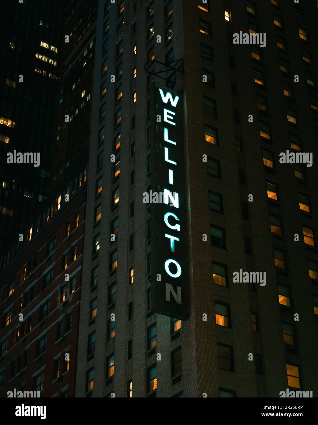 Wellington Hotel vintage sign at night, Midtown Manhattan, Manhattan ...