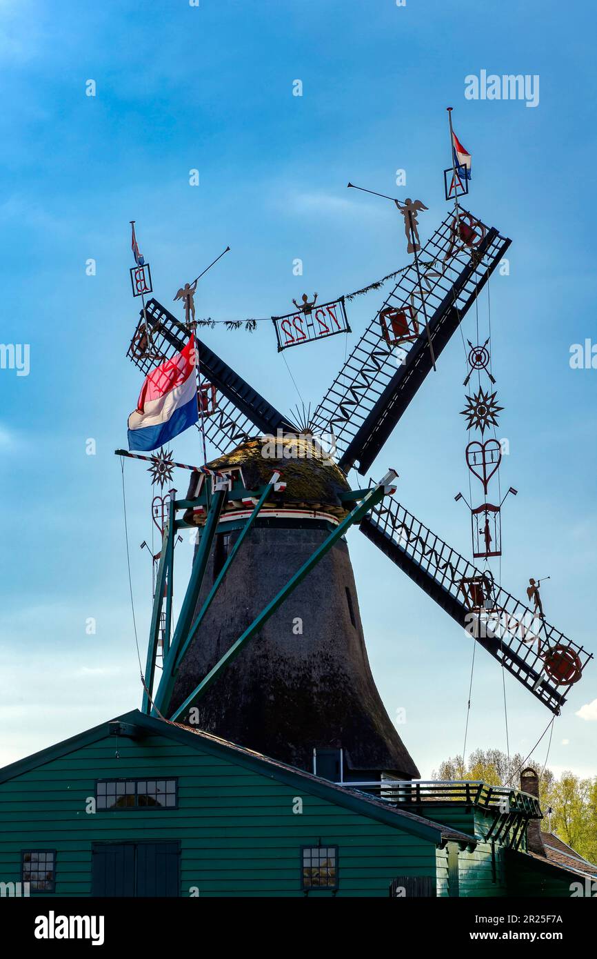 Paper producing windmill called De Schoolmeester with decorated wings ...
