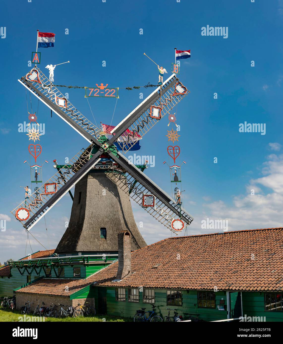 Paper producing windmill called De Schoolmeester with decorated wings ...