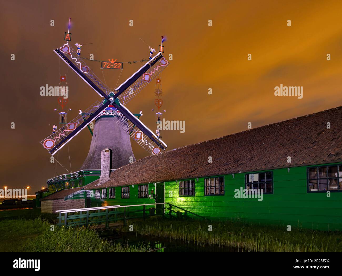Paper producing windmill called De Schoolmeester with decorated wings ...