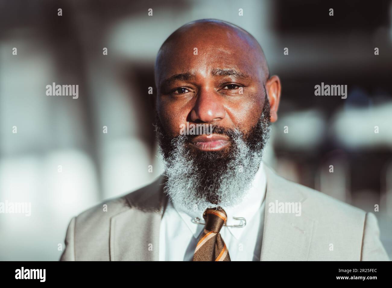 Lisbon; A close-up portrait of a charming black man with a long beard ...