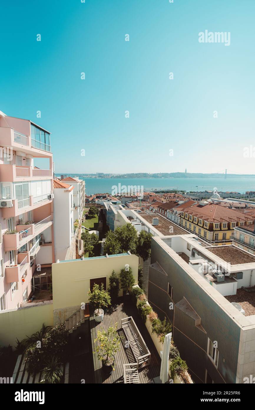 Lisbon; vertical; wide-angle; a view from an apartment with a salmon ...
