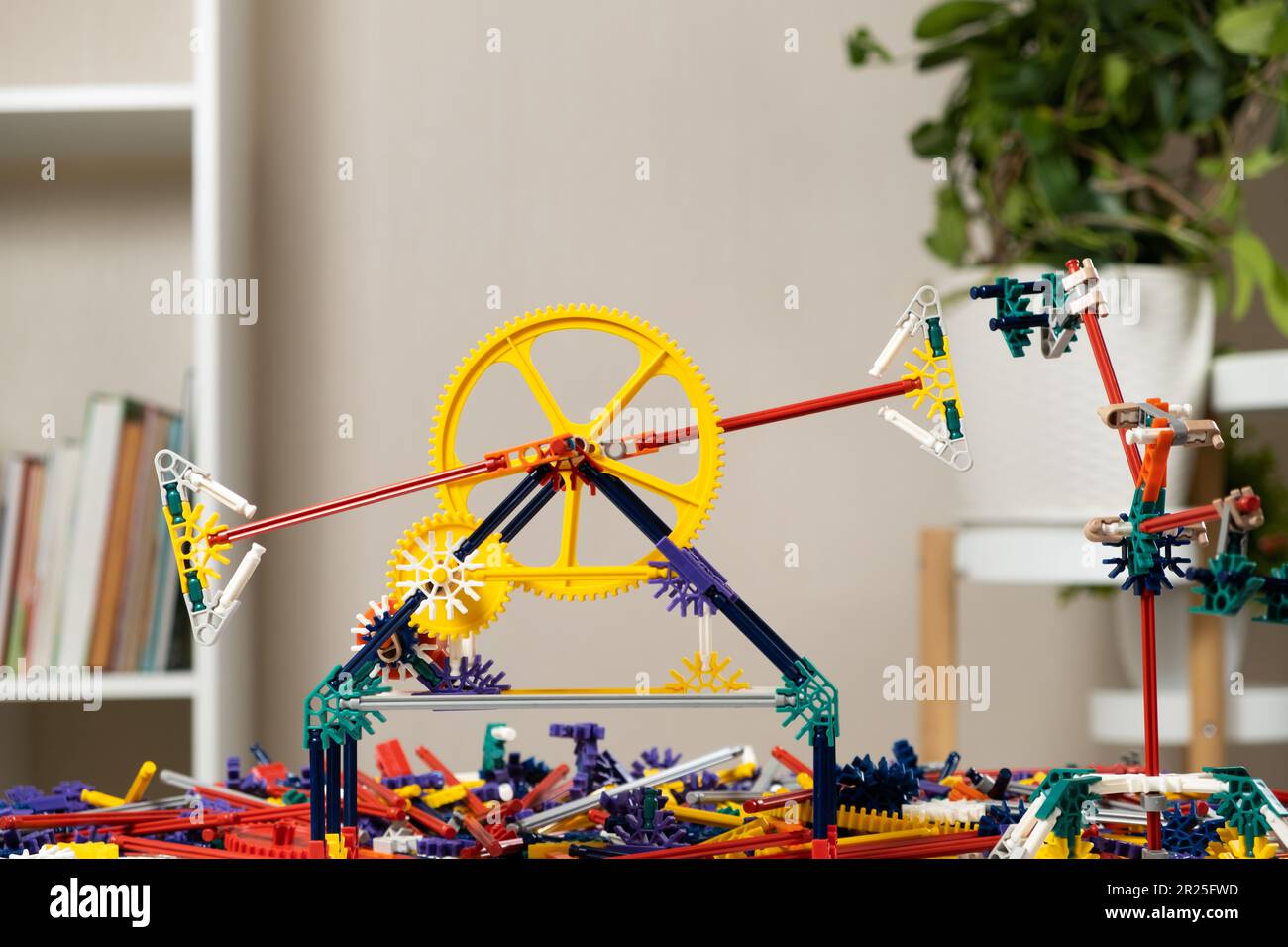 Children's constructor of gears cogwheel and sticks in the children's ...