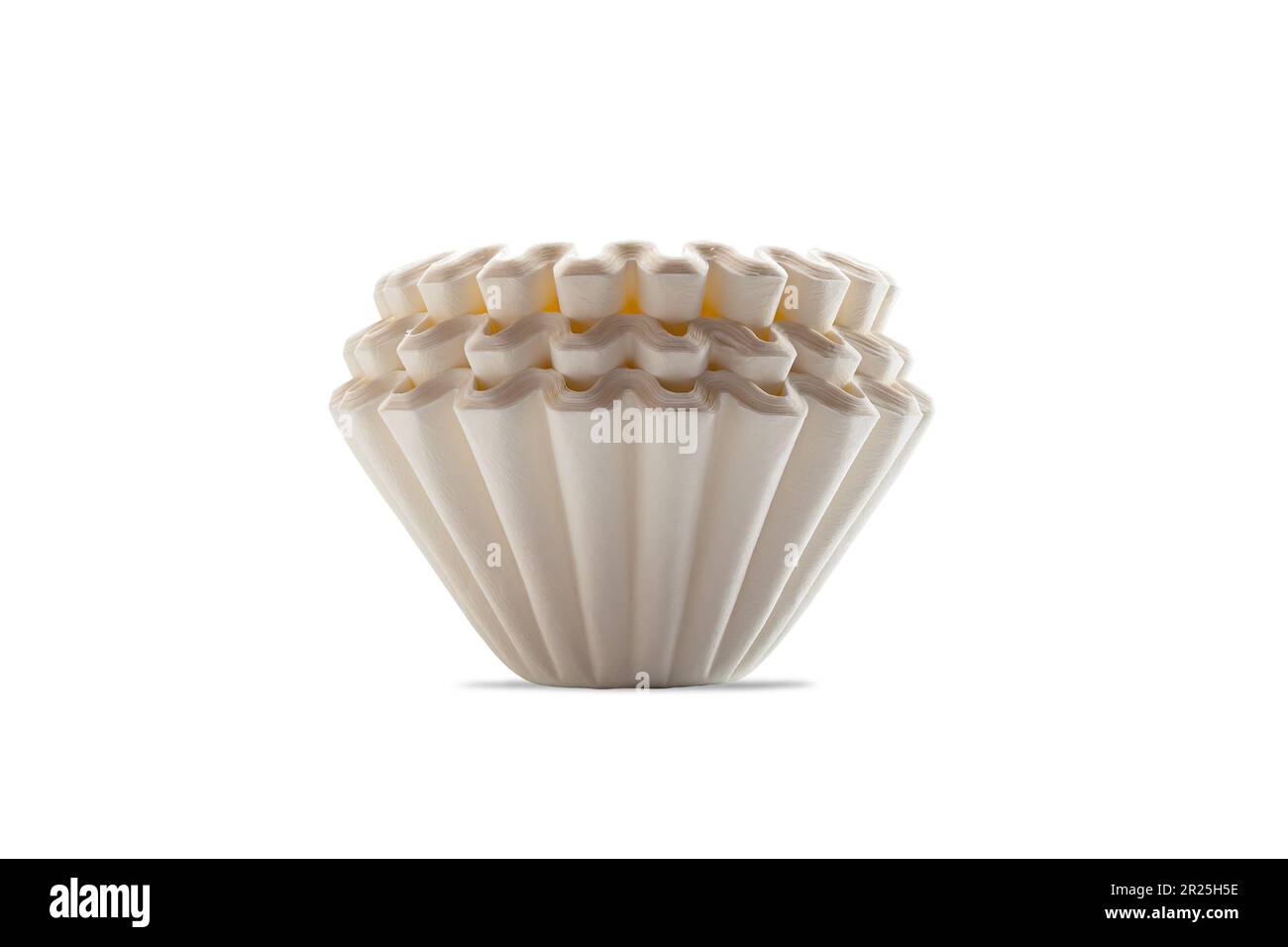 Side view closeup stack of new unbleached basket-type disposable paper ...