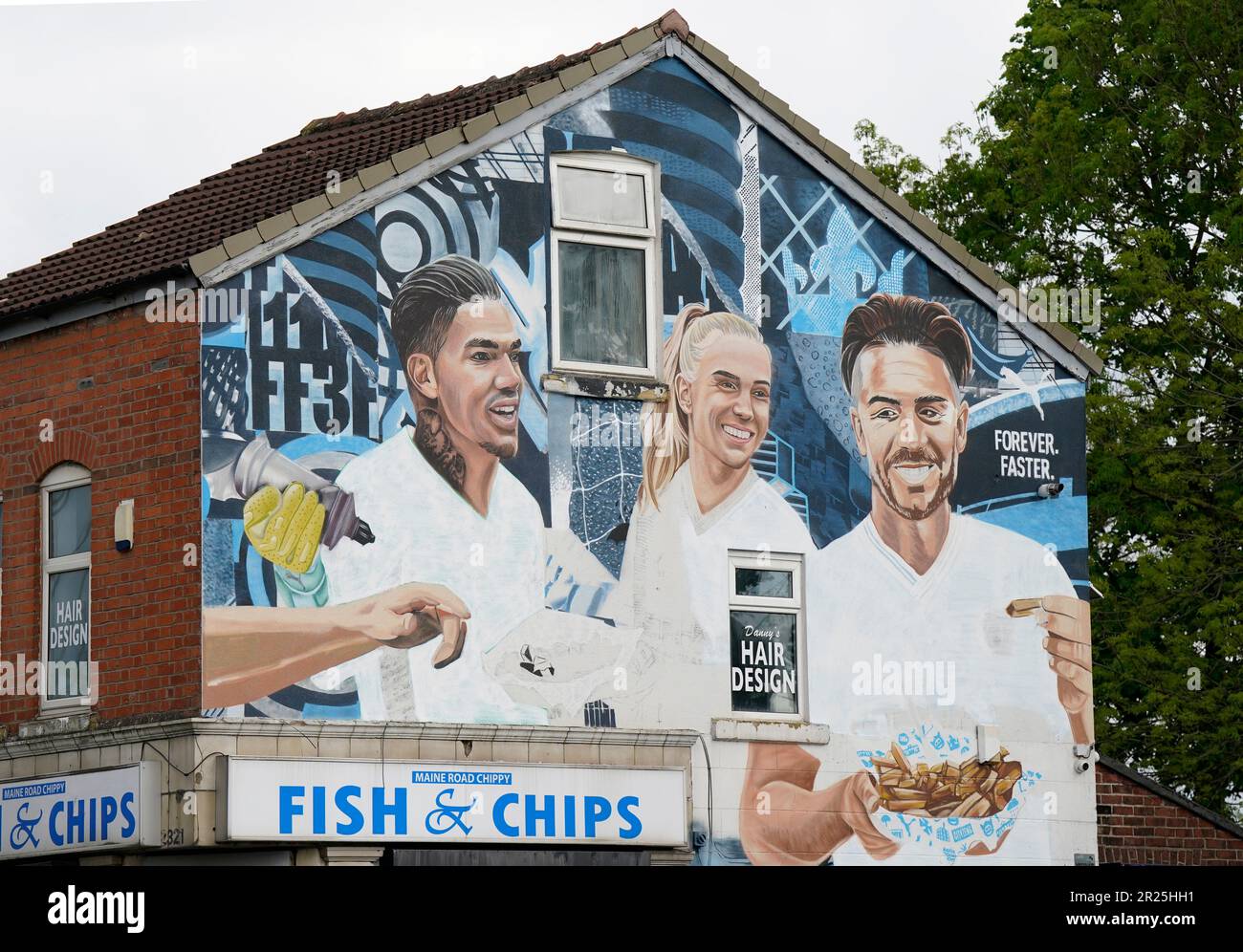 Manchester, UK. 17th May, 2023. A giant mural on the side of a local ...