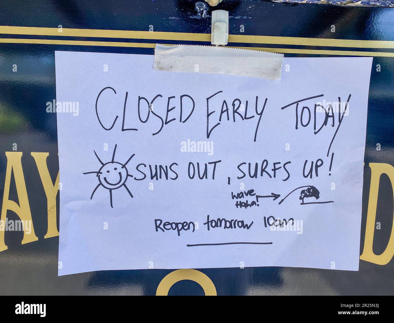 Funny Hand-Written Sign: Close early today. Suns out, Surfs Up. Reopen ...
