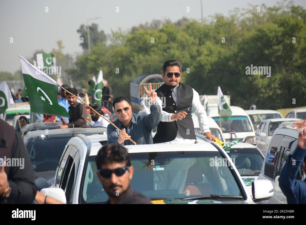 Islamabad, Pakistan. 17th May, 2023. People carrying flags of Pakistan ...