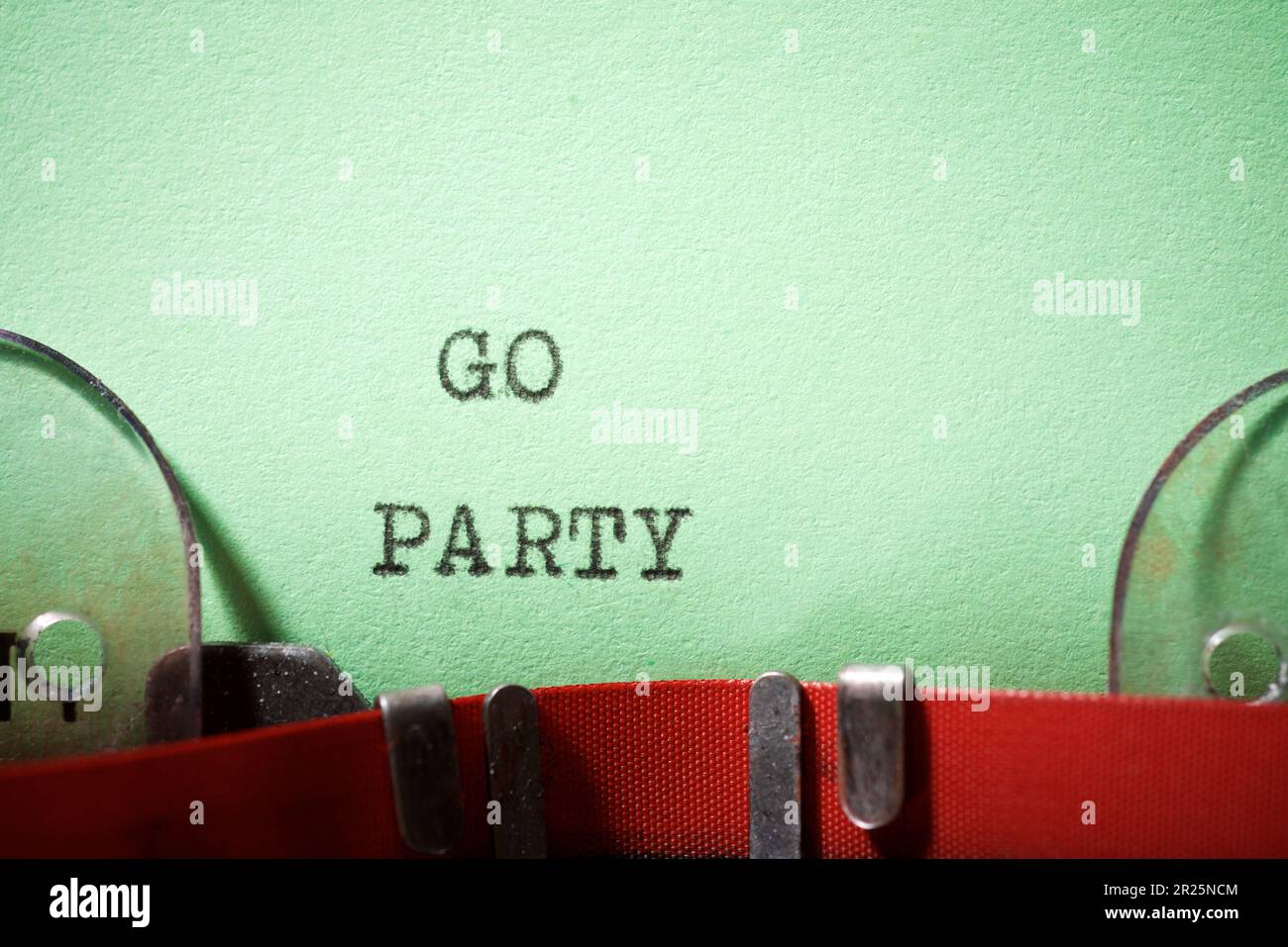 Go party text written with a typewriter Stock Photo - Alamy